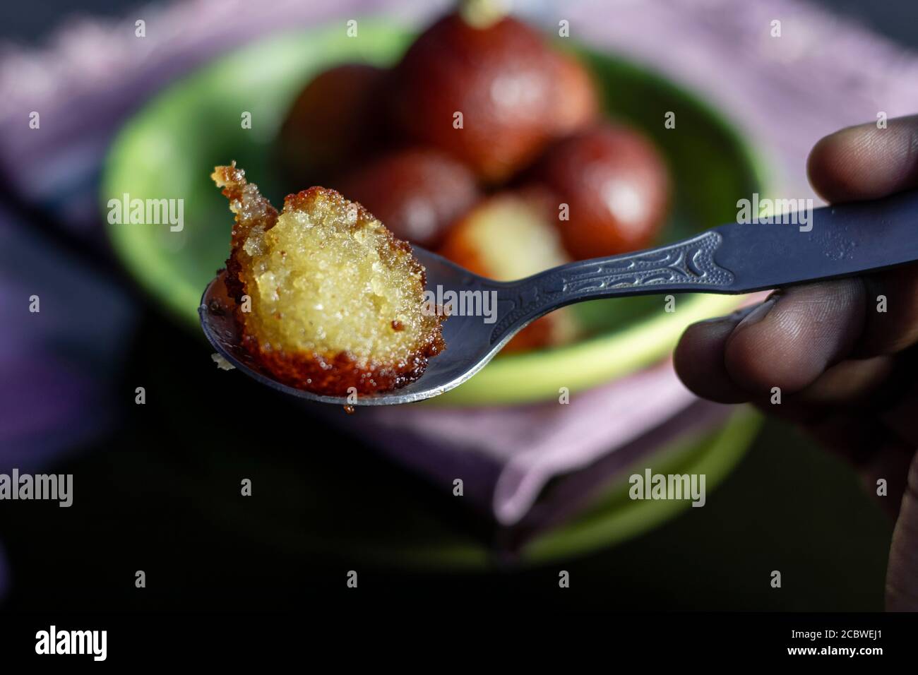 one of the most common sweets of India - Gulab jamun on a plate Stock ...