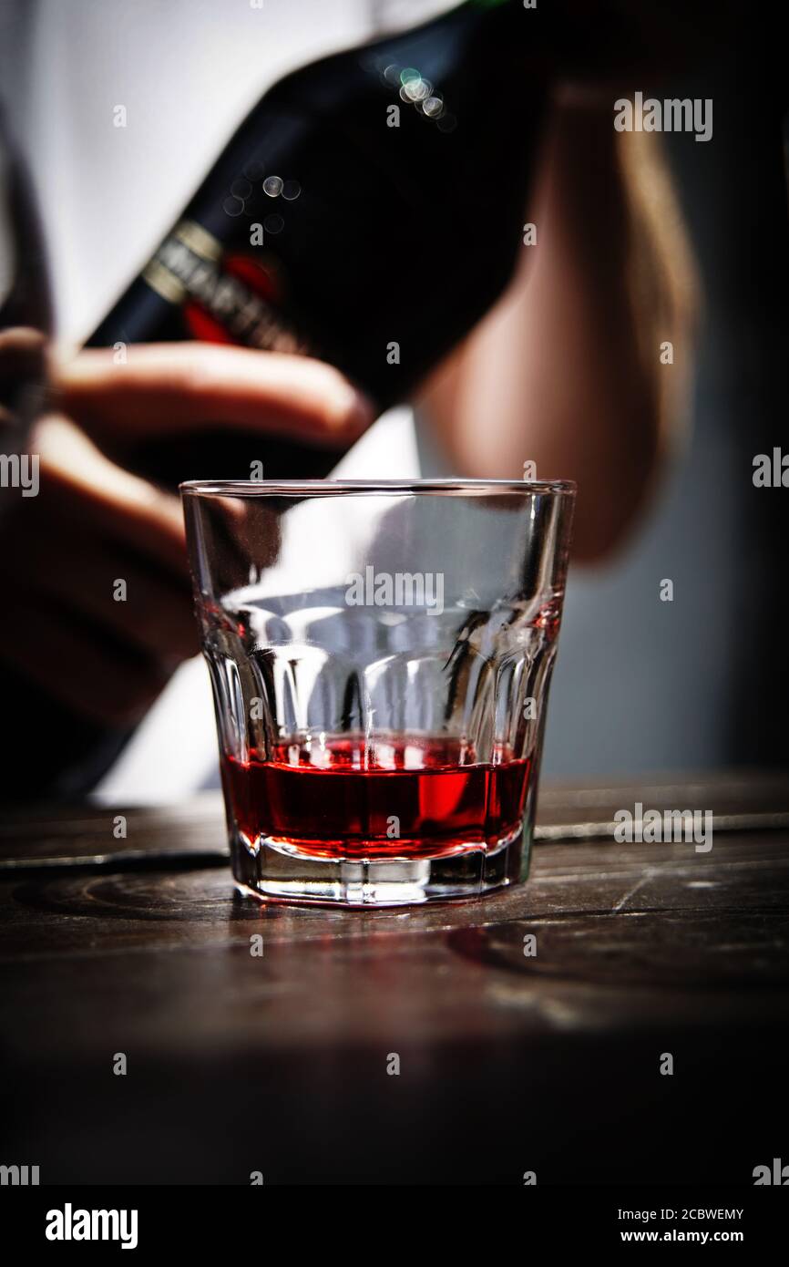 Glass of alcohol drink Stock Photo - Alamy