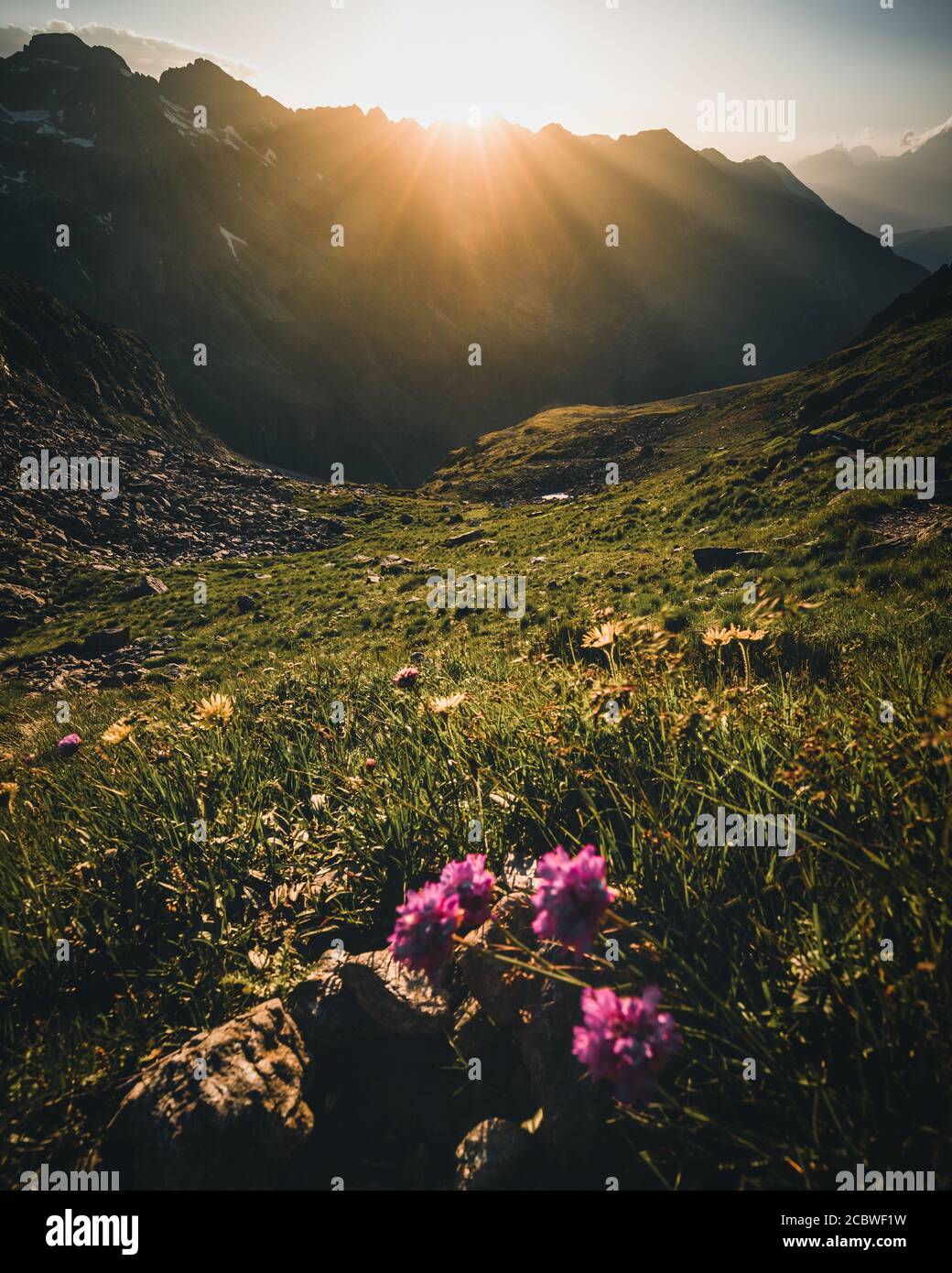 colorful sunset on top of austrian mountain alps - schladminger tauern ...
