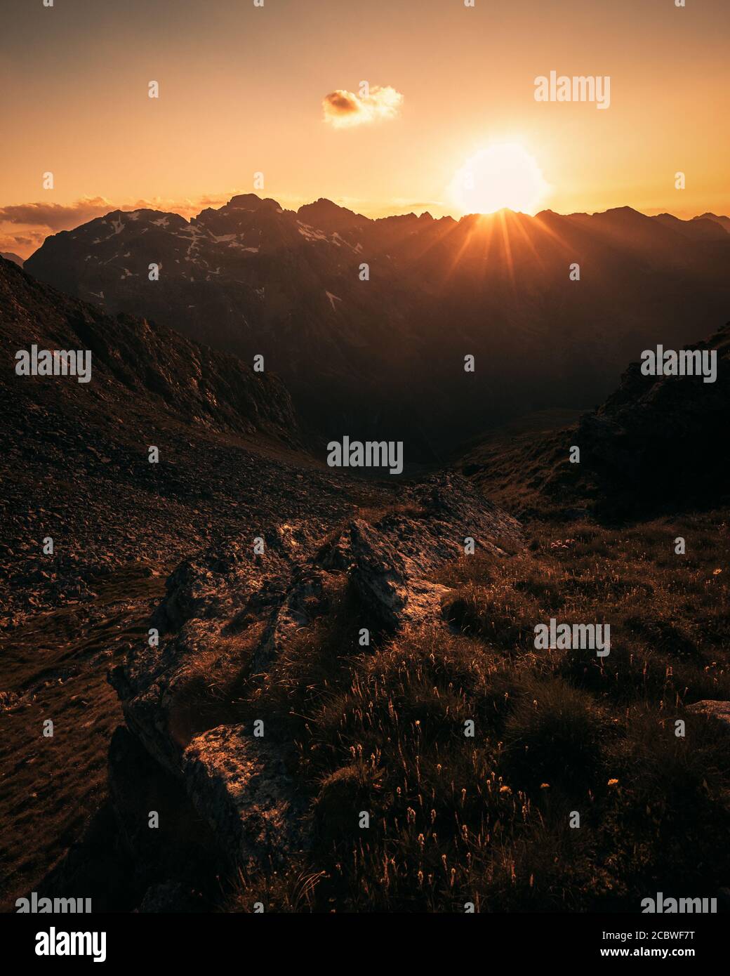 colorful sunset on top of austrian mountain alps - schladminger tauern ...