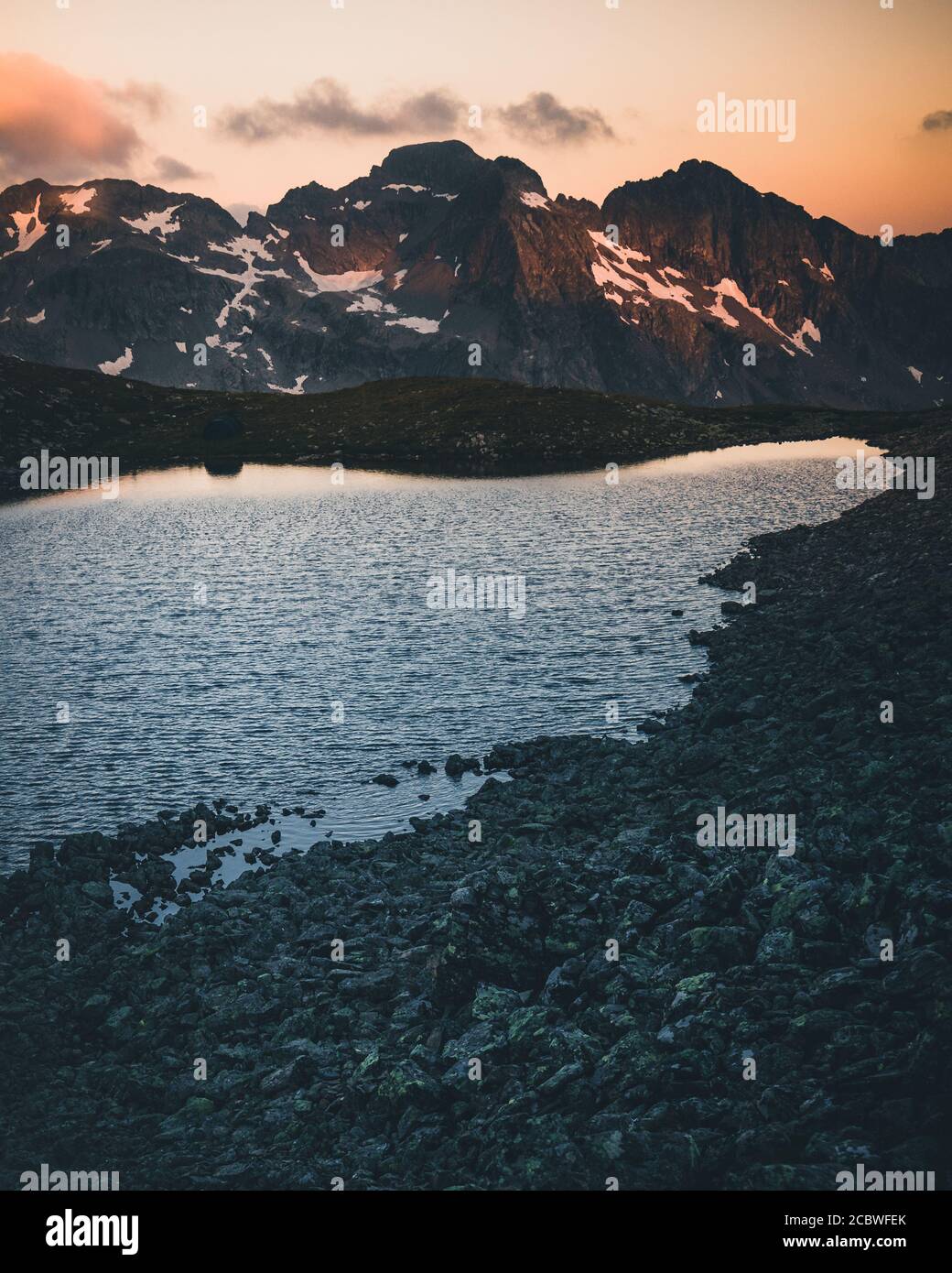 colorful sunset on top of austrian mountain alps - schladminger tauern ...