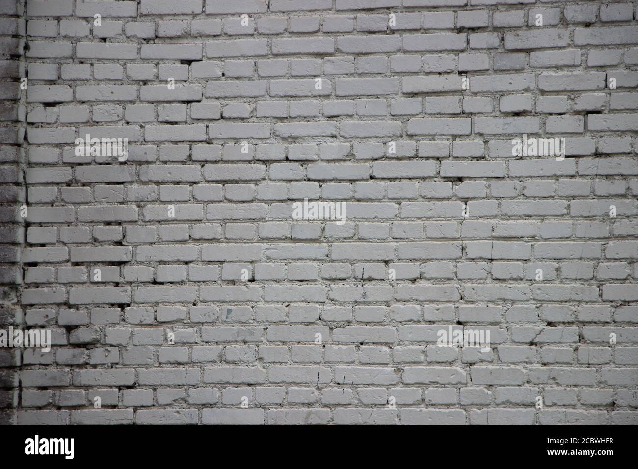 Light grey grunge brick wall background texture Stock Photo - Alamy