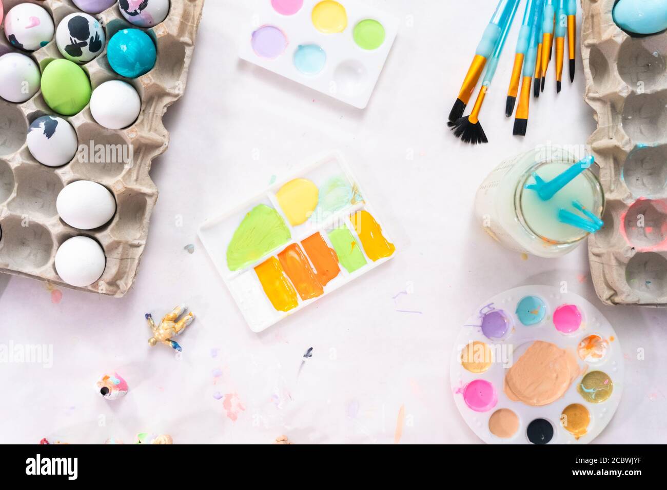 Flat lay. Painting craft Easter eggs with arcylic paint Stock Photo - Alamy