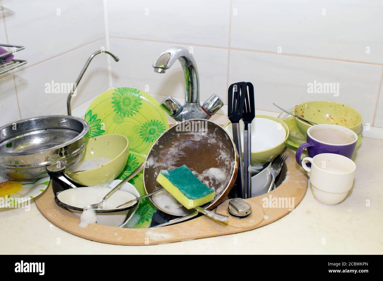 A bunch of dirty dishes in the kitchen Stock Photo - Alamy