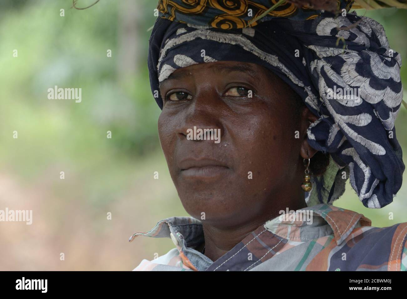 An congolease black man standing with baber Stock Photo - Alamy