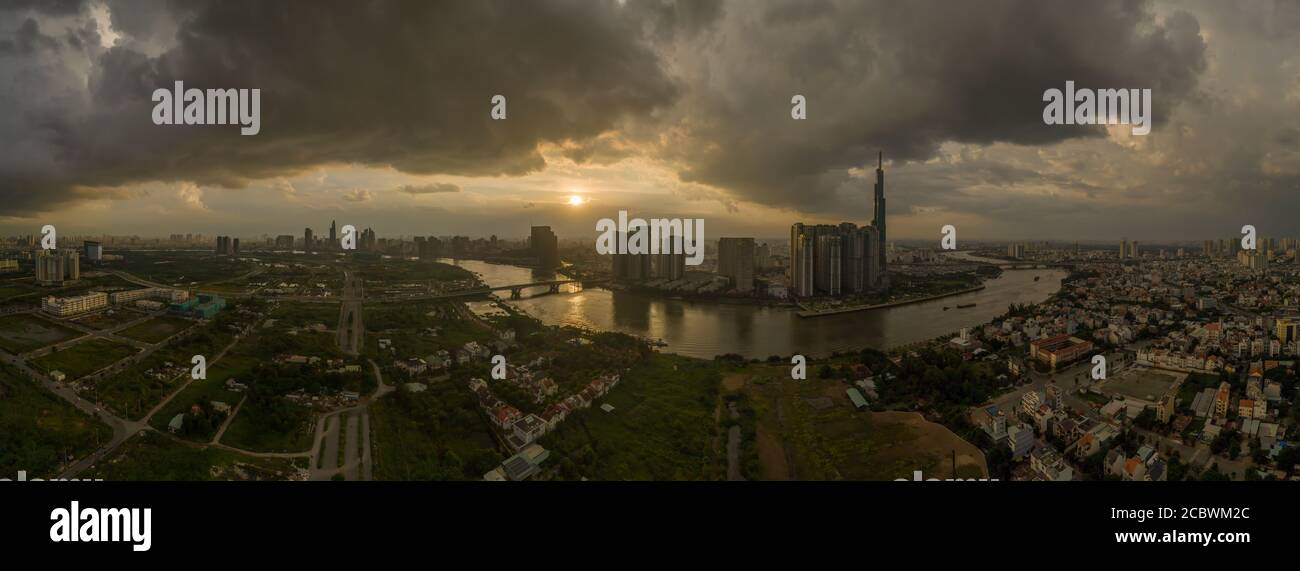 Saigon River aerial panorama with Ho Chi Minh City Skyline during a ...