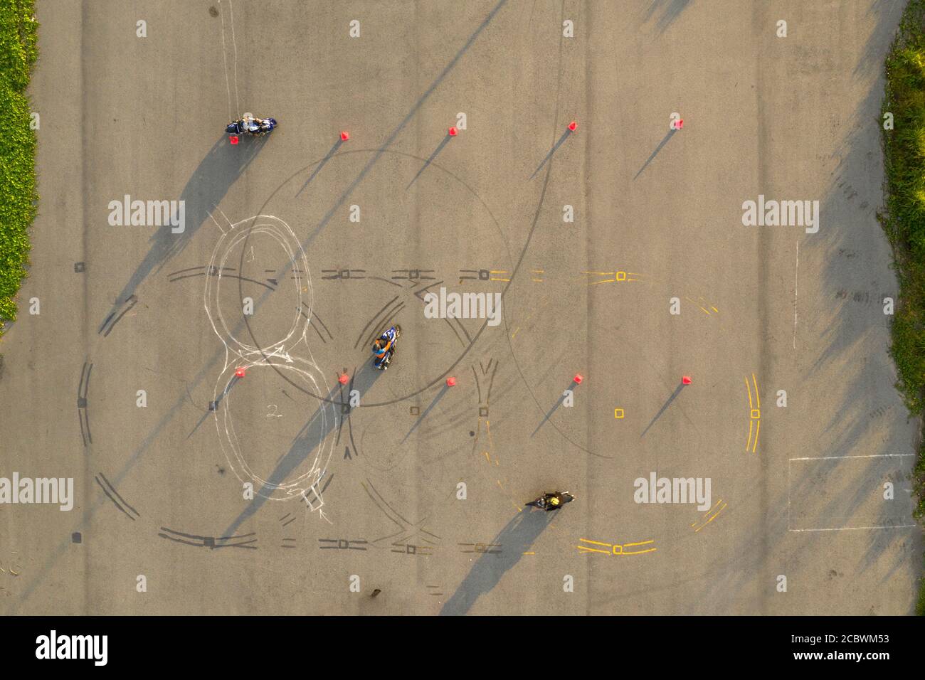 top down wide aerial view of four riders having fun on an advanced ...