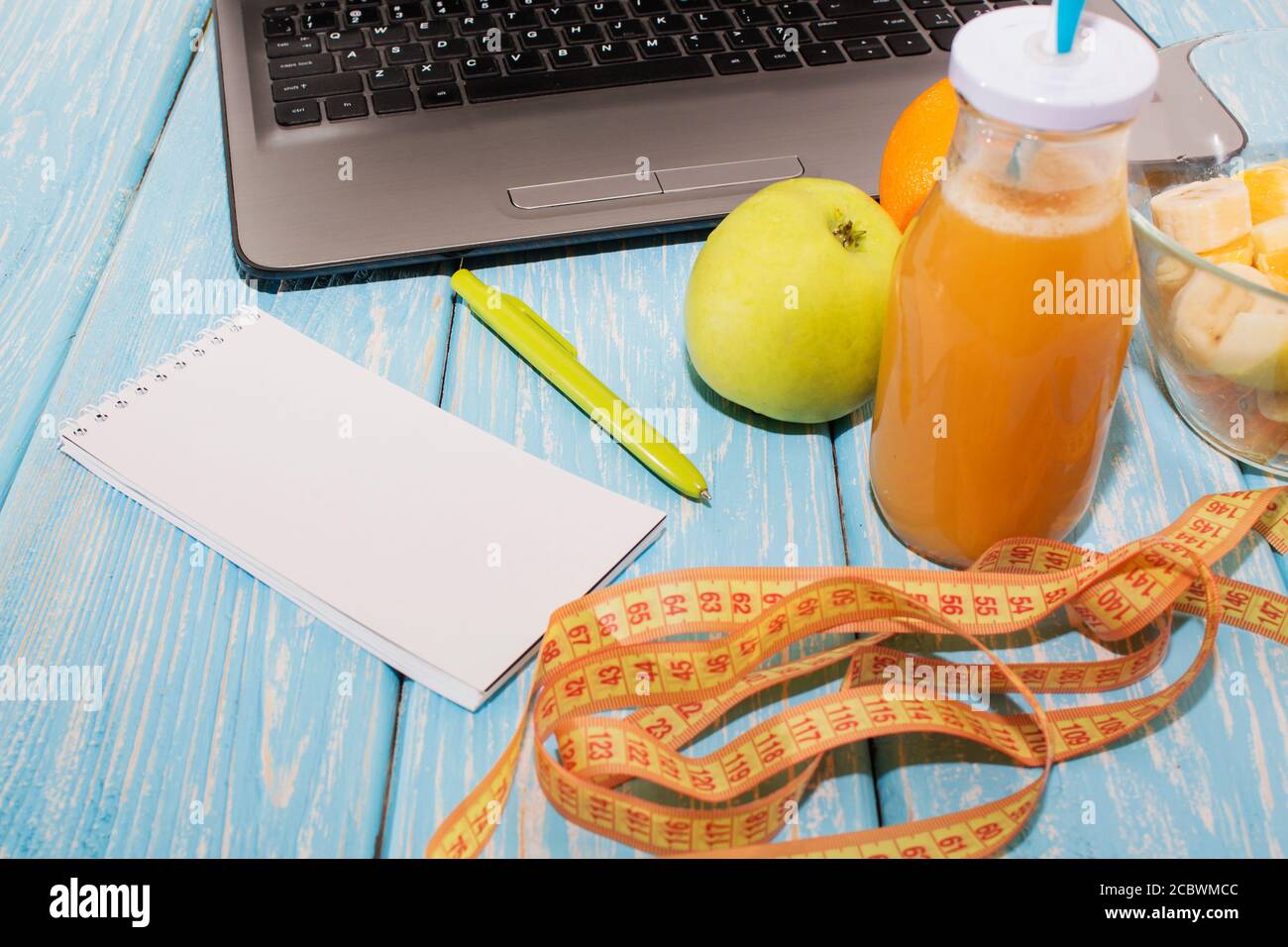 Workplace Desk with laptop, computer, notebook, pen, marker. Useful ...