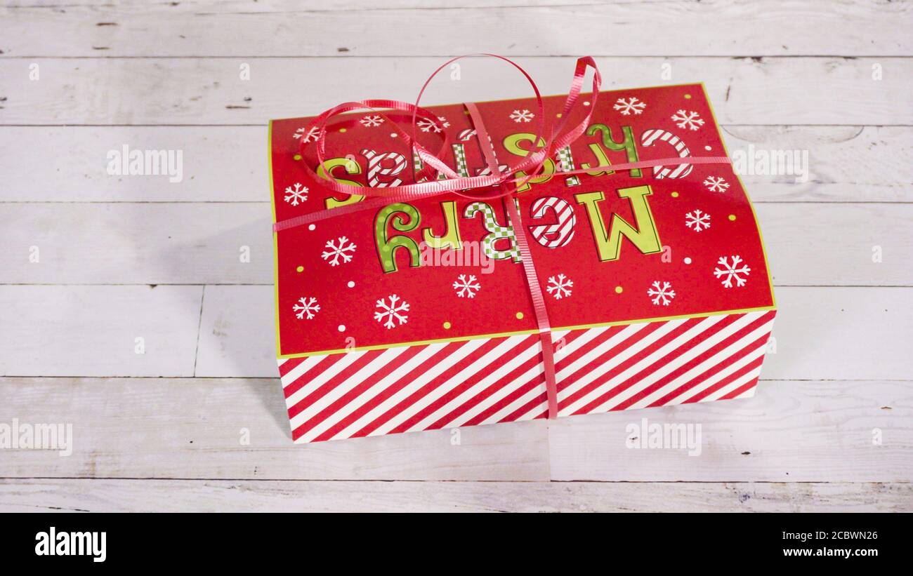 Step by step. Packaging homemade fudge and cookies into a Christmas ...