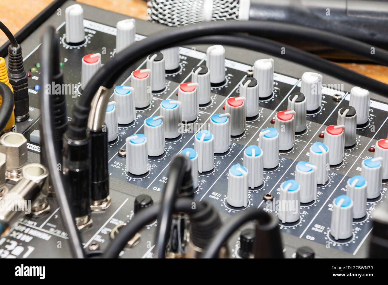 audio jack and wires connected to audio mixer, music dj equipment at ...