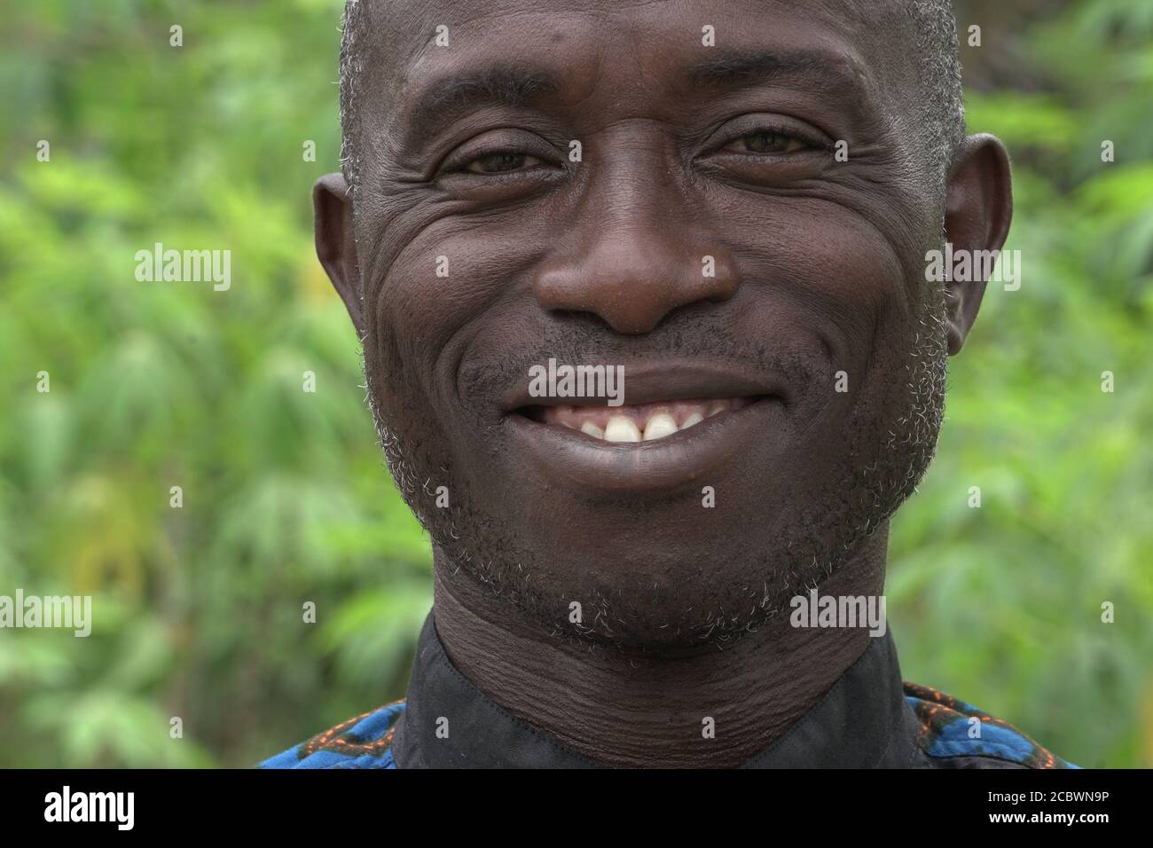 An congolease black man standing with baber Stock Photo - Alamy