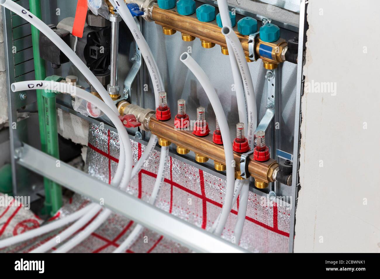 Main Control manifold of house floor heating system Stock Photo - Alamy