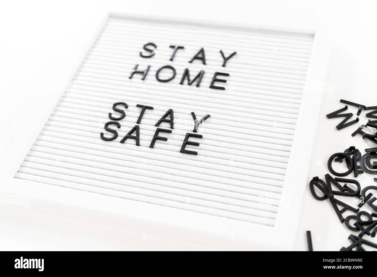 STAY HOME and STAY SAFE sign on message board Stock Photo - Alamy