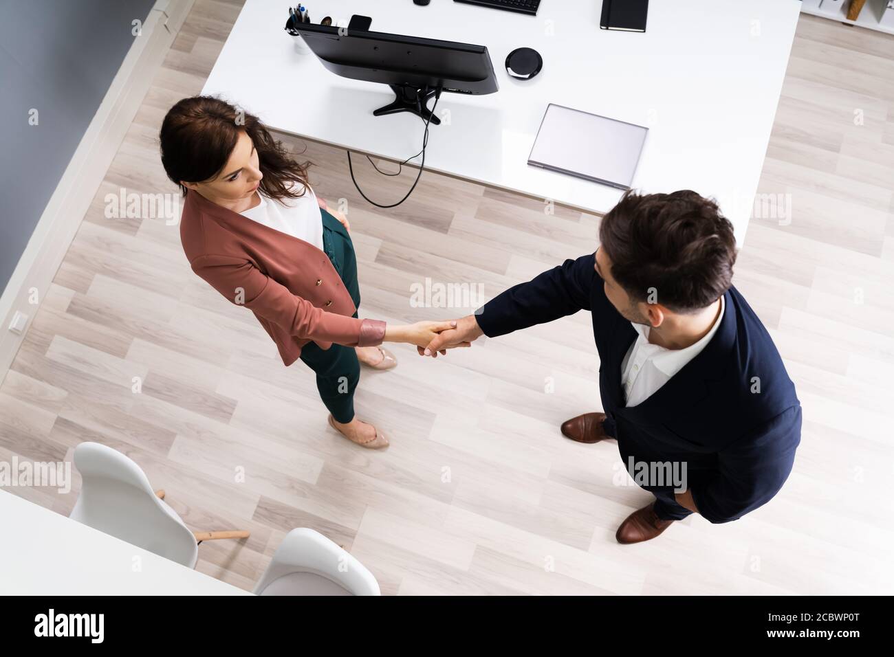 Professional Business People Shaking Hands. Top View Stock Photo - Alamy
