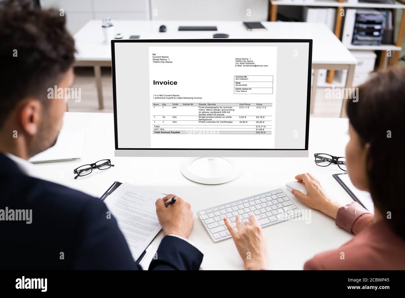 Accountant Checking Business Invoice Or Bill On Laptop Stock Photo - Alamy