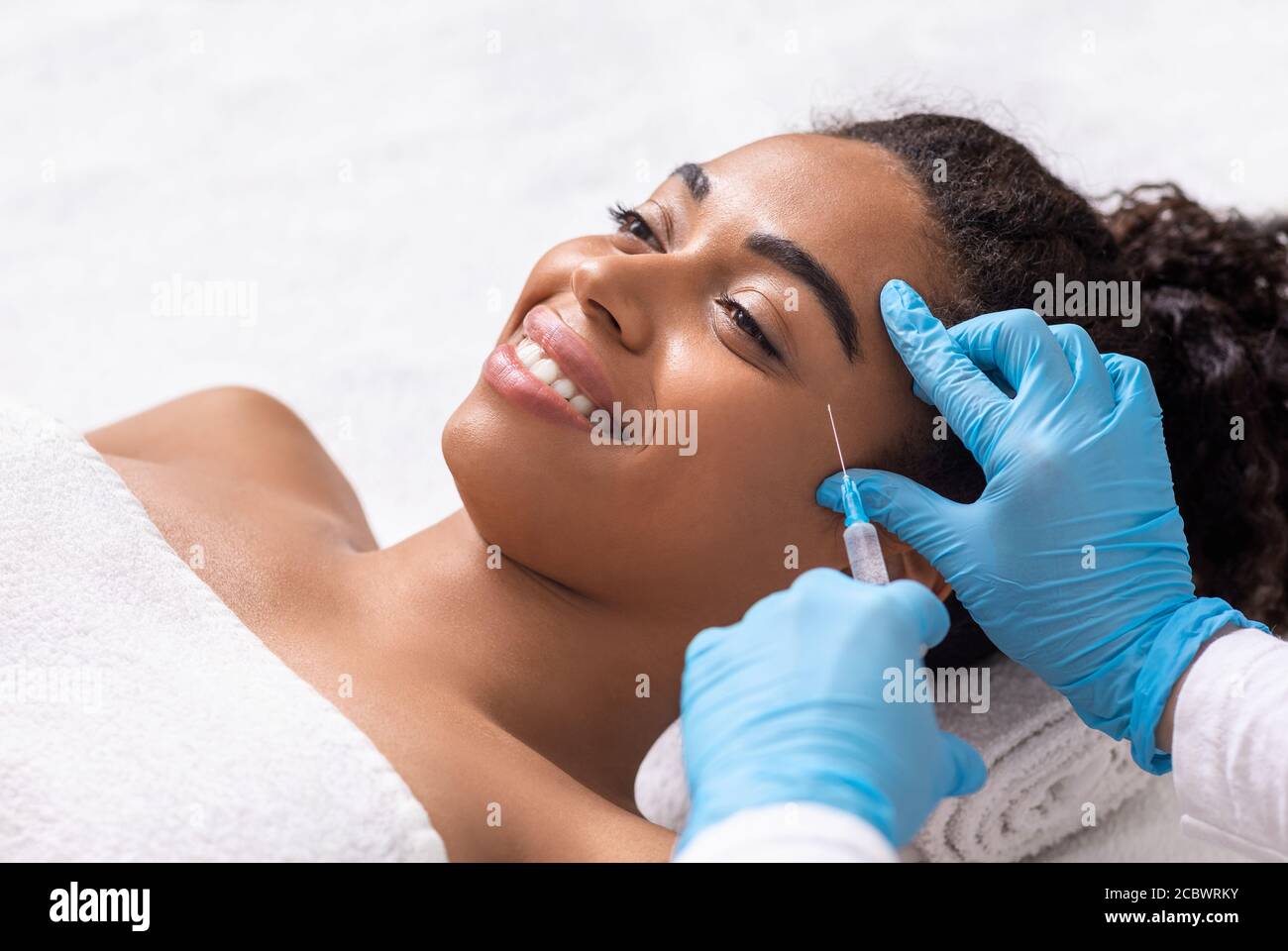 Woman having injection syringe hi-res stock photography and images - Alamy