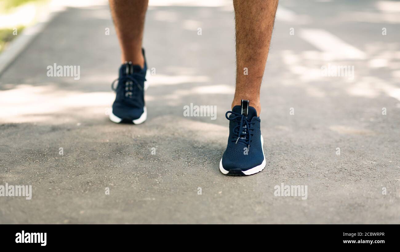 Black runner hi-res stock photography and images - Alamy