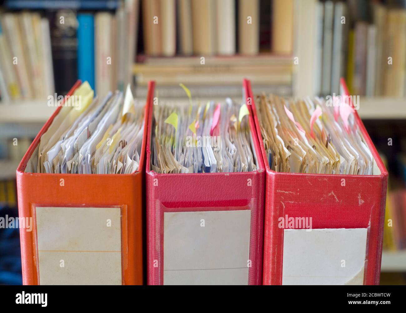 messy file folders and documents, bureaucracy and red tape concept ...