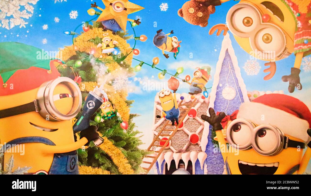 Close up of Christmas version of HAPPY MINION statue in Universal ...