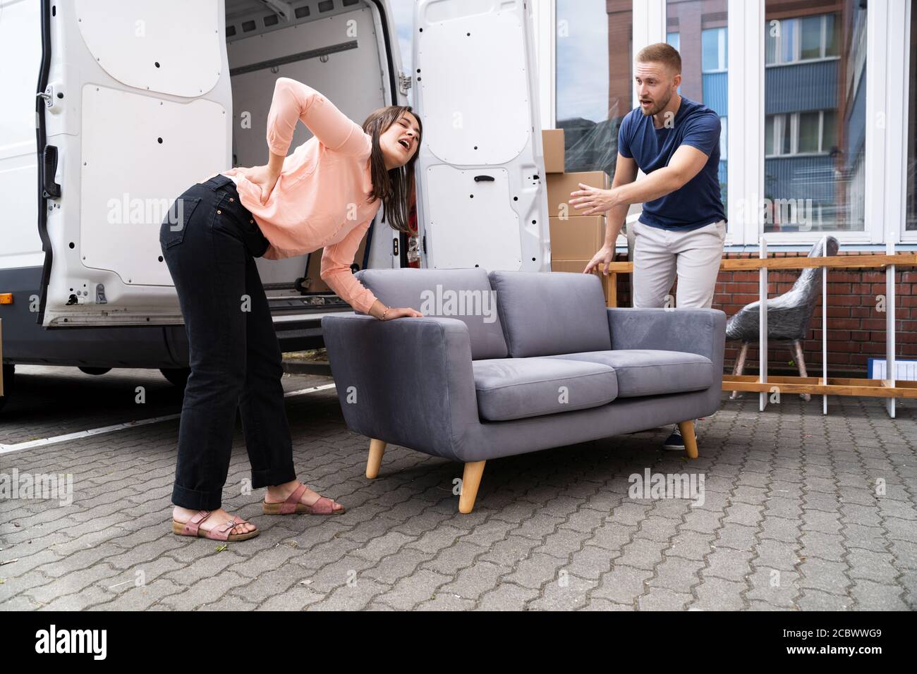 Carrying heavy furniture hi-res stock photography and images - Alamy