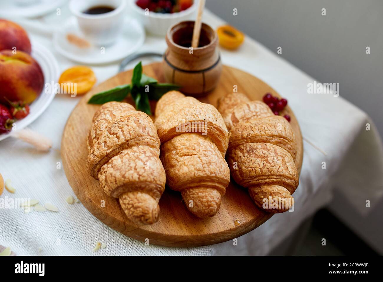 Continental breakfast table served with traditional French croissant ...