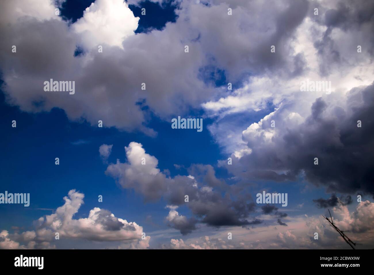 Blue sky background with clouds Stock Photo - Alamy