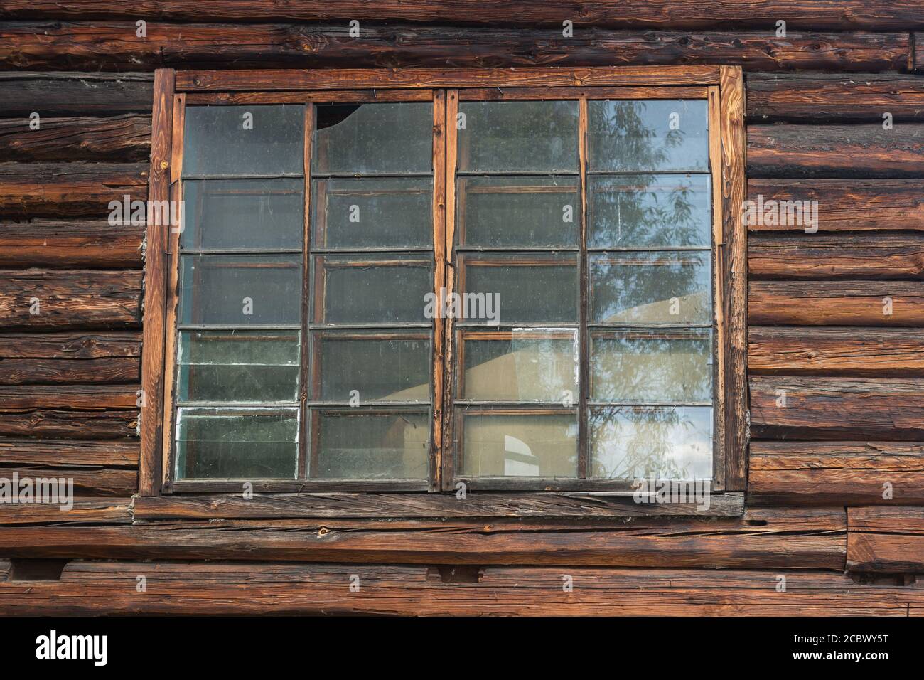 window of an old wooden house dust on the glass Stock Photo - Alamy