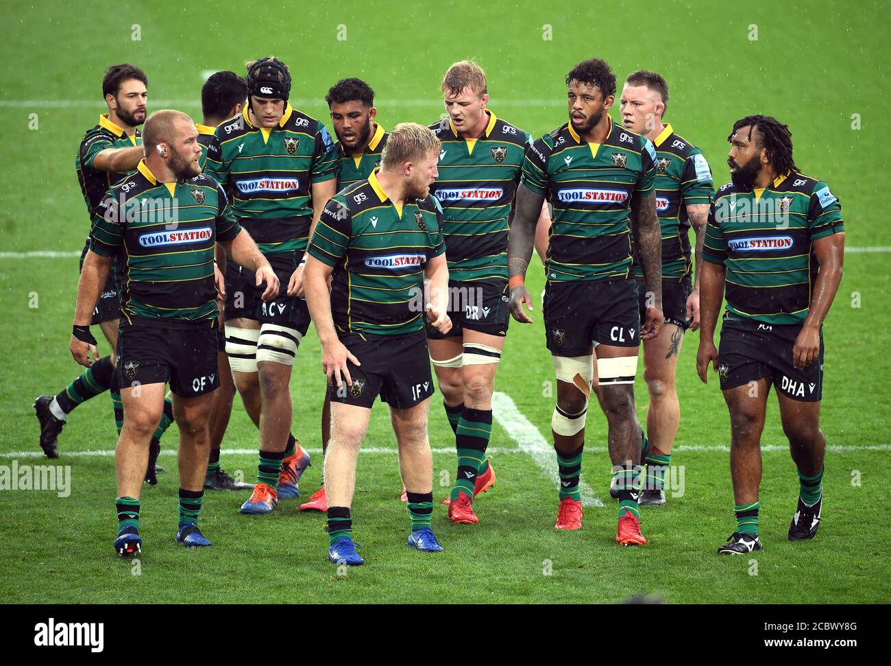 Northampton Saints' David Ribbans (centre) celebrates scoring his side ...