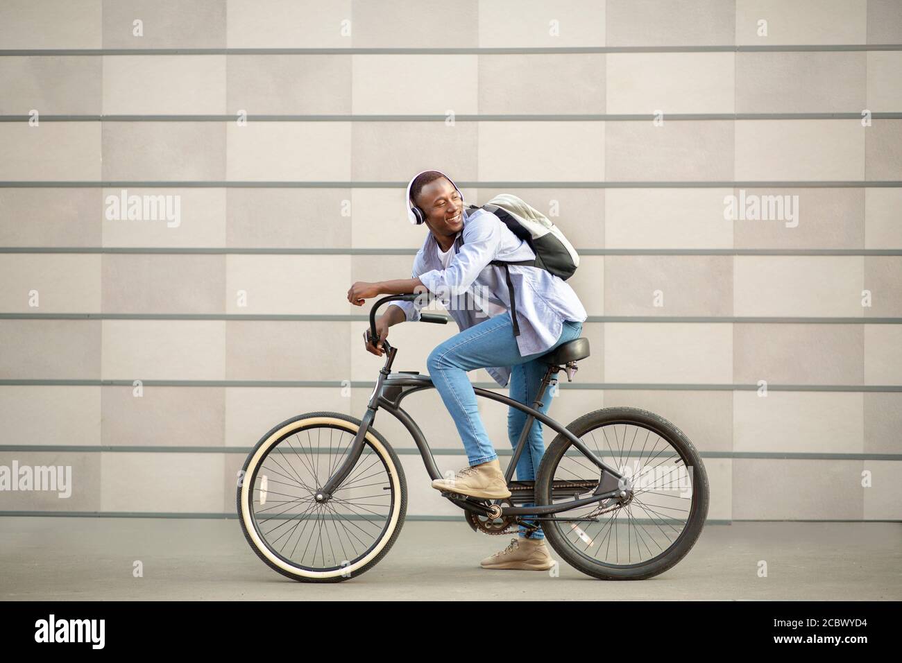 Guy riding bicycle hi-res stock photography and images - Alamy