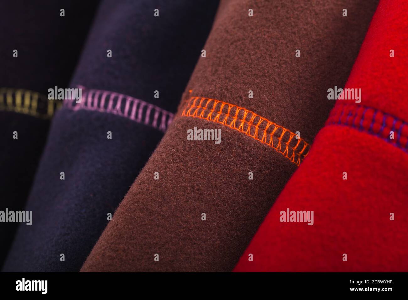 Colorful fleece clothes with seams, close up photo Stock Photo - Alamy