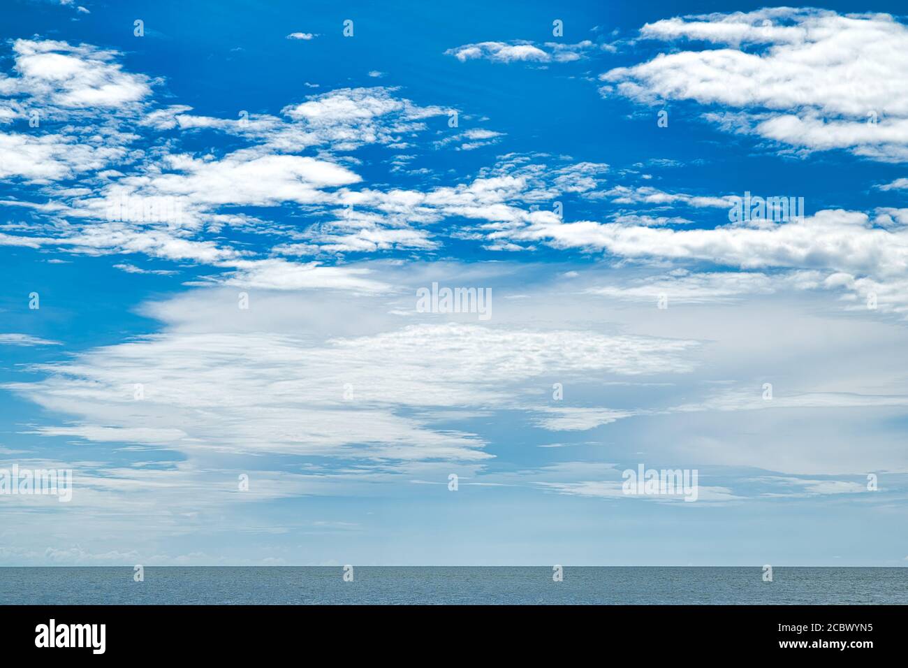 perfect blue sky with clouds and water of the sea, Ocean and sky ...