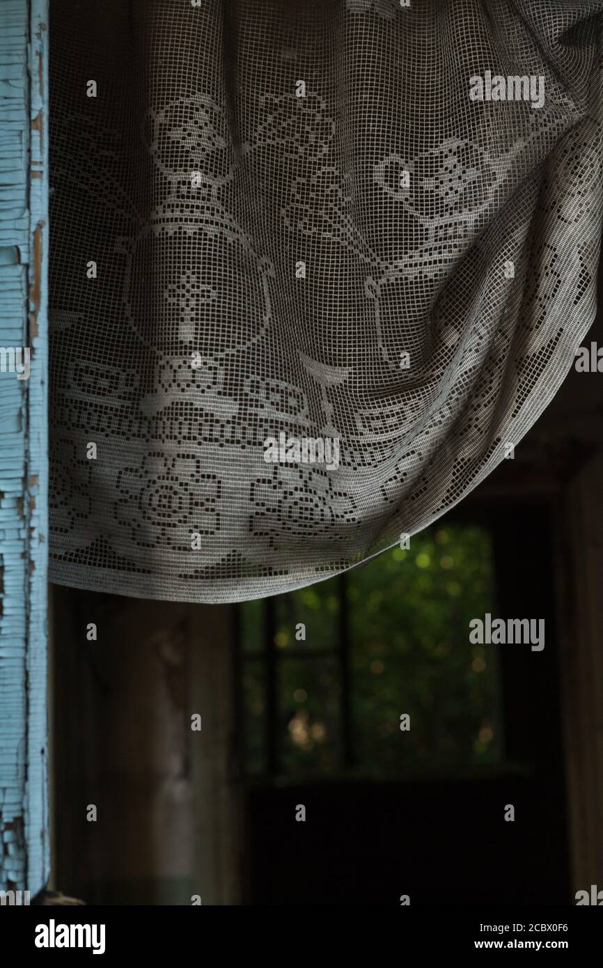 The old dirty wooden wall windows show the fallen curtains Stock Photo ...