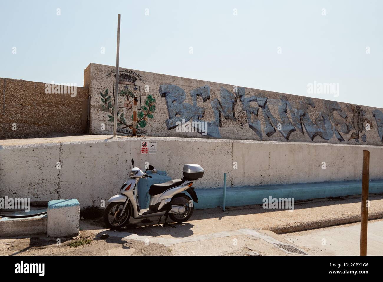 Street art, graffiti, in Cala Gonone harbor Stock Photo - Alamy