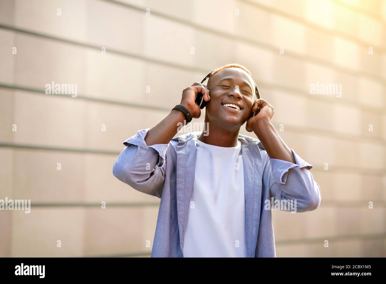 Attractive black guy headphones on hi-res stock photography and images ...