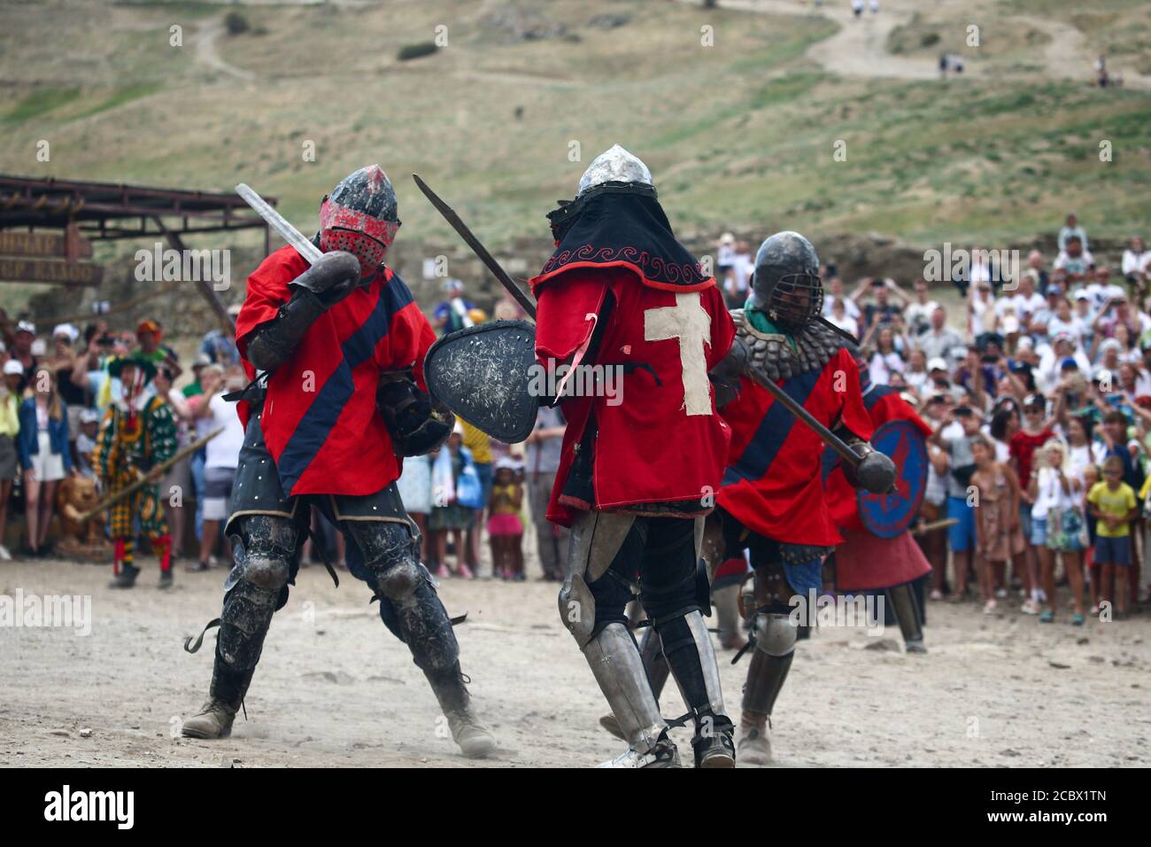 Crimea, Russia. 16th Aug, 2020. Men in armour engage in a sword fight ...