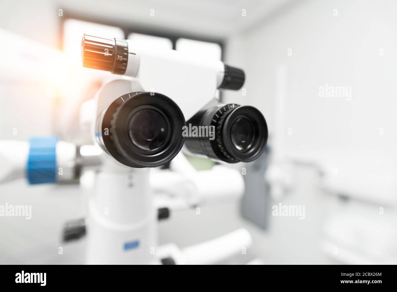 Dental endodontic binocular microscope. Closeup of a dentist microscope ...