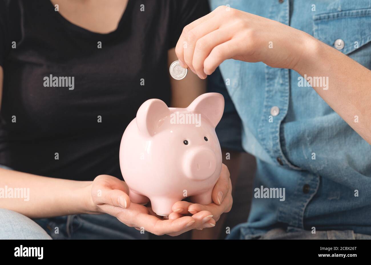 Home budget, couple family finance with piggy bank Stock Photo - Alamy