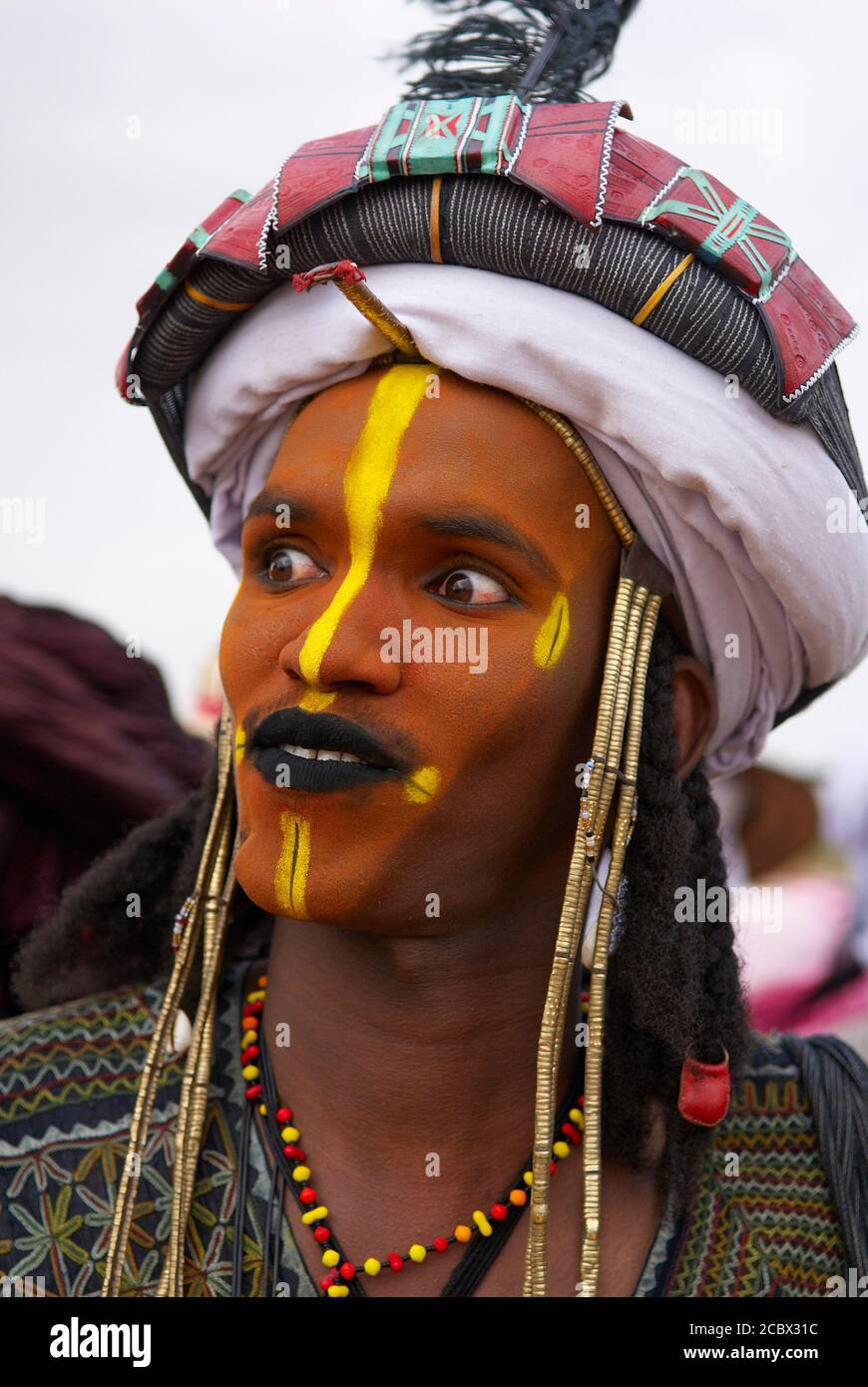 Niger. A Wodaabe-Bororo man with his face painted for the annual ...