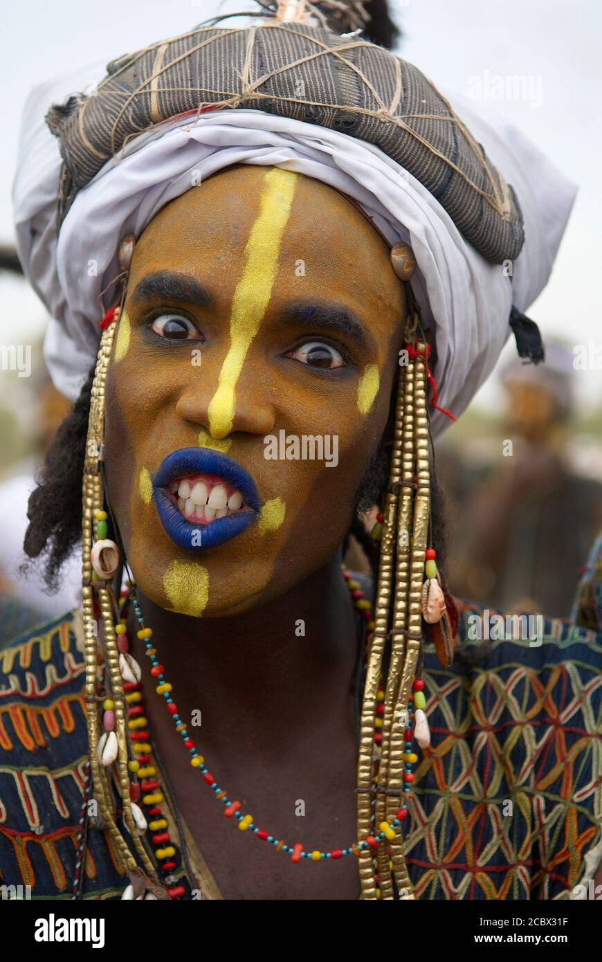 Niger. A Wodaabe-Bororo man with his face painted for the annual ...