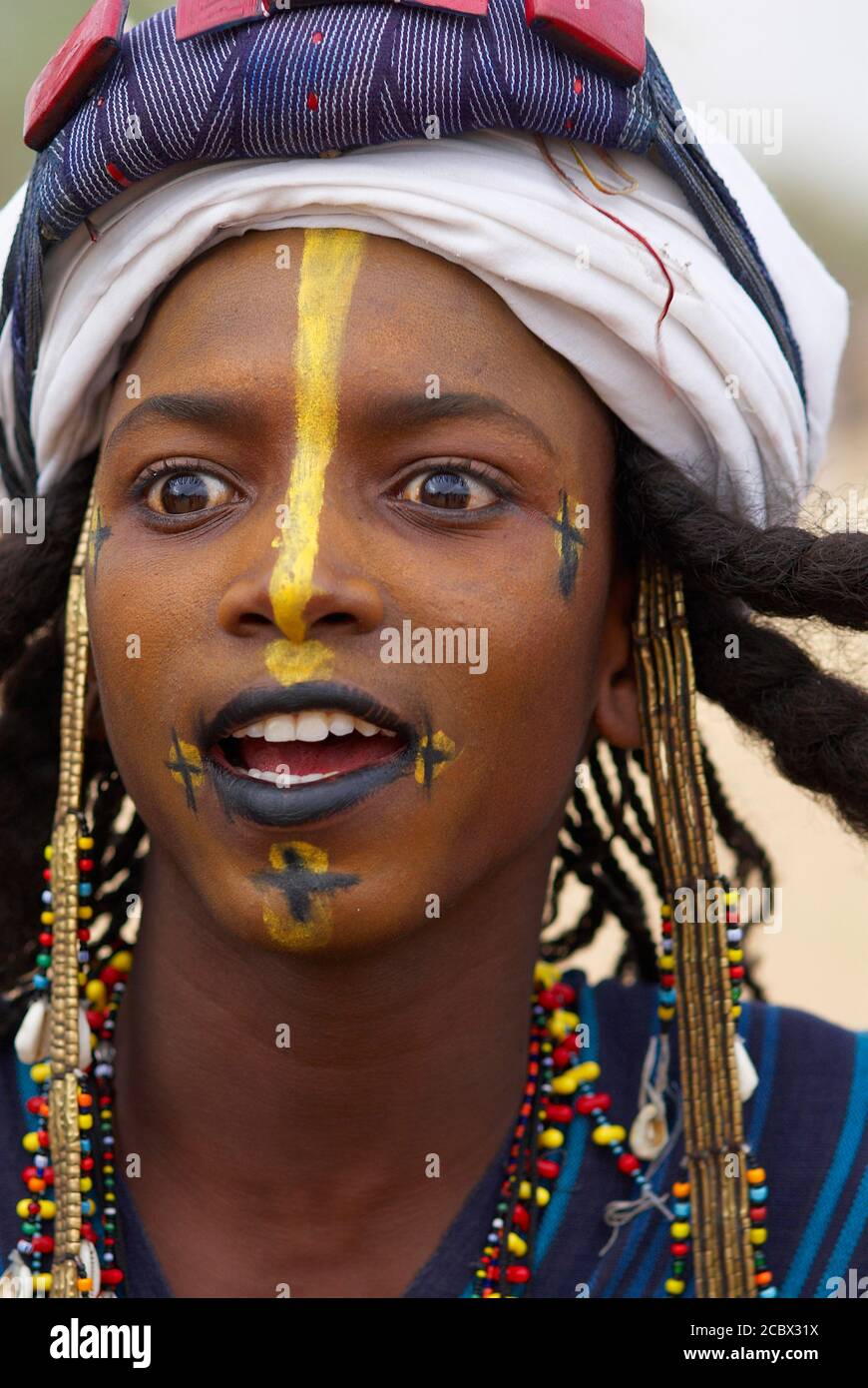 Niger. A Wodaabe-Bororo man with his face painted for the annual ...