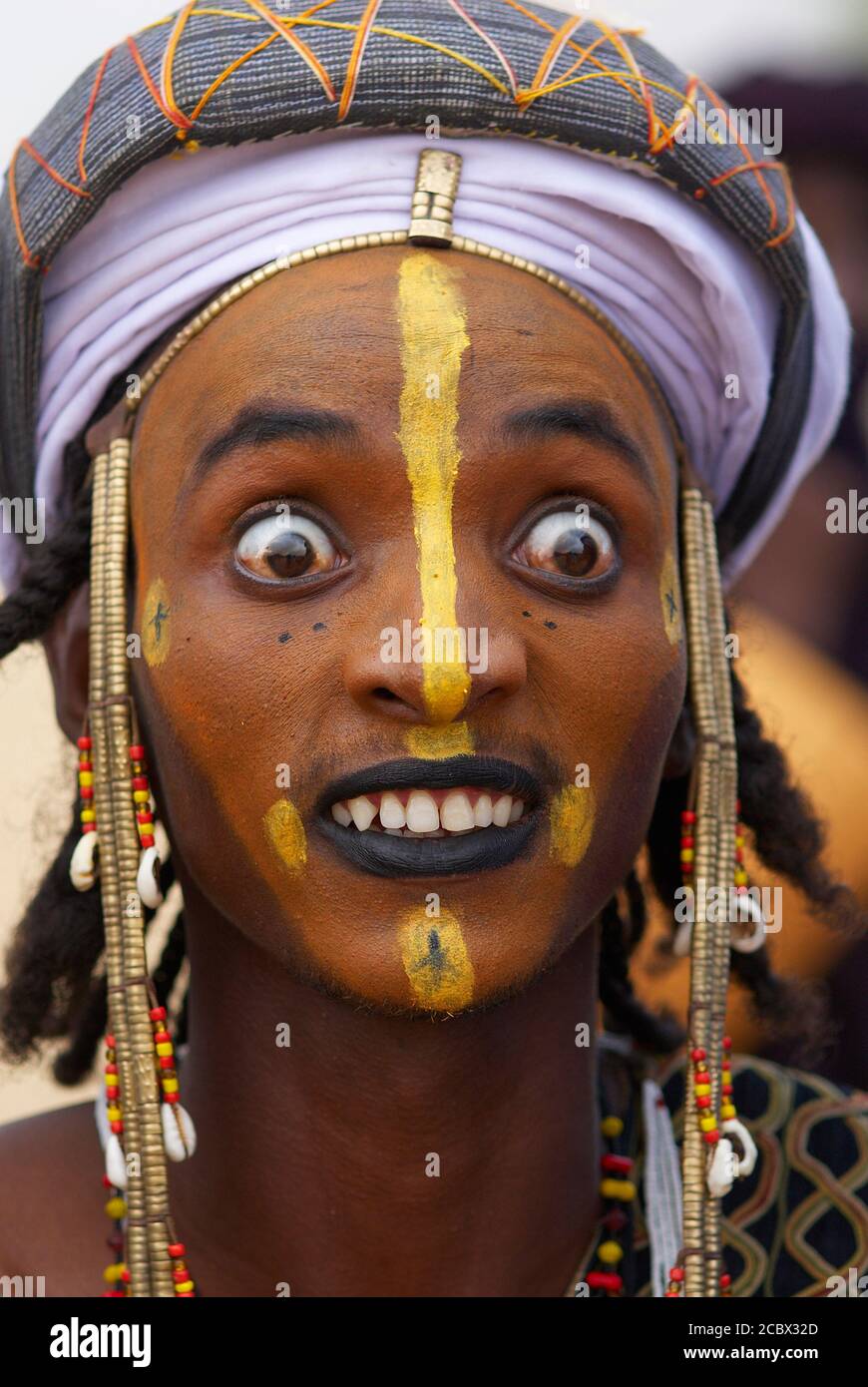 Niger. A Wodaabe-Bororo man with his face painted for the annual ...