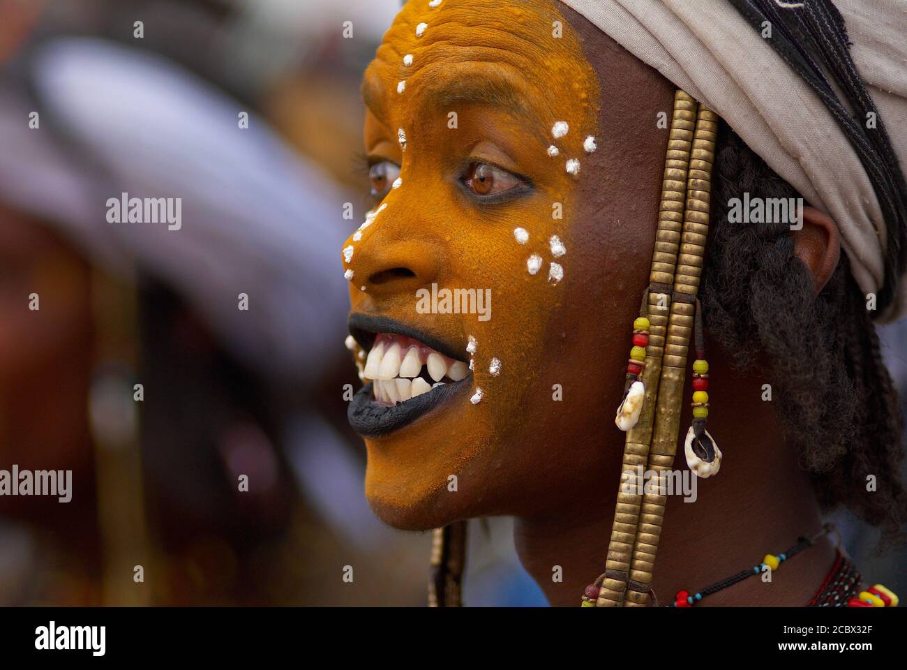 Niger. A Wodaabe-Bororo man with his face painted for the annual ...