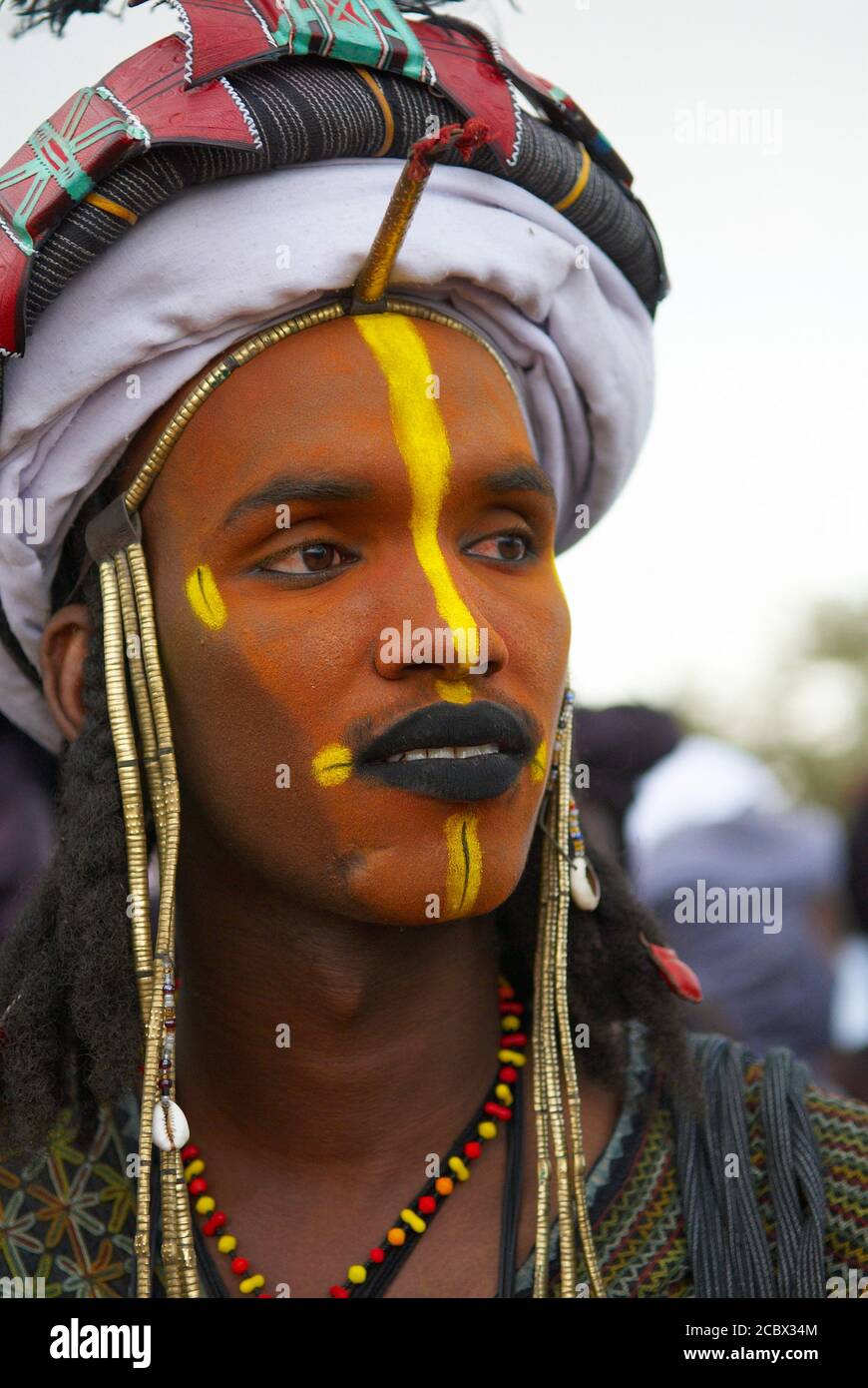 Niger. A Wodaabe-Bororo man with his face painted for the annual ...