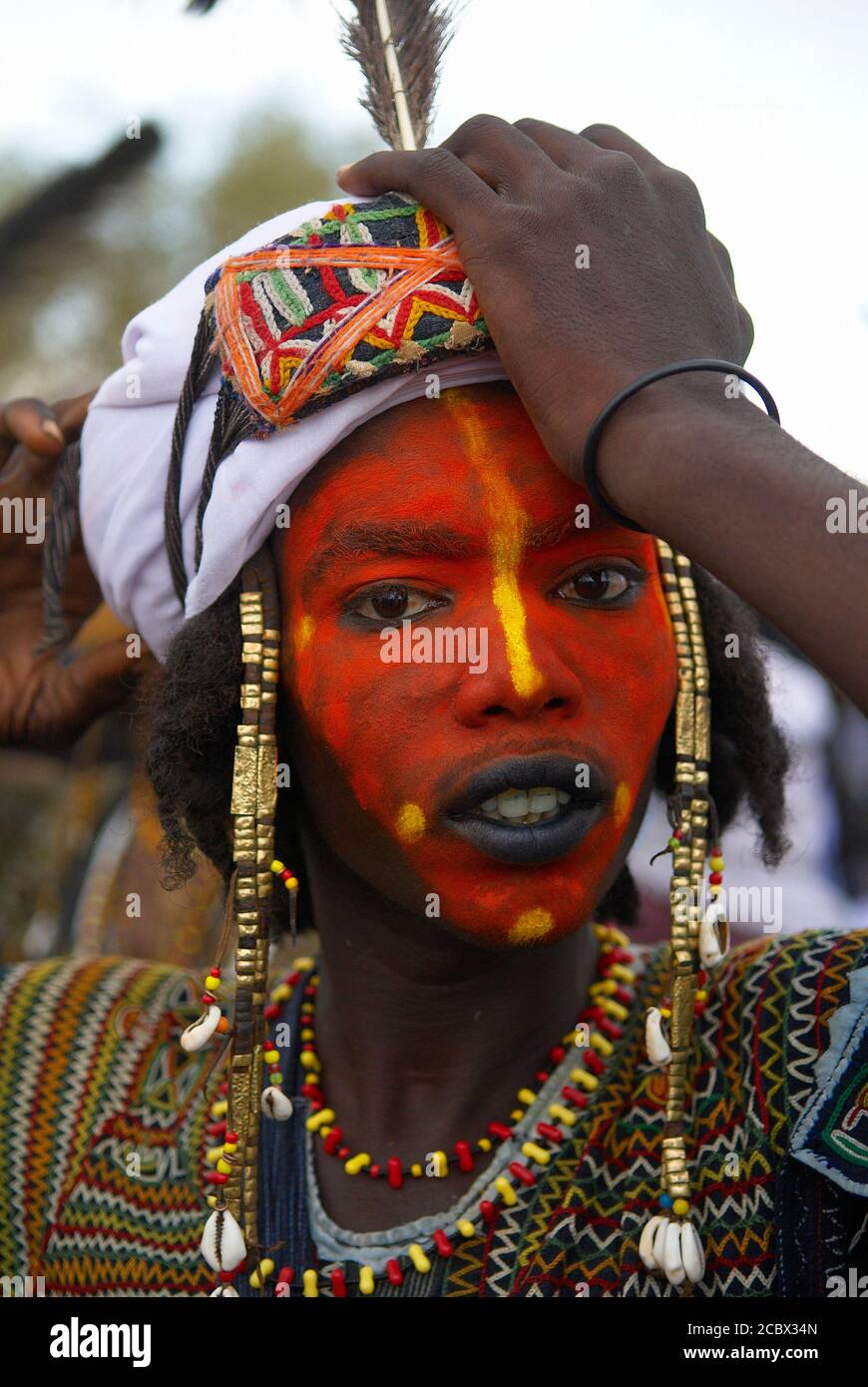 Niger. A Wodaabe-Bororo man with his face painted for the annual ...
