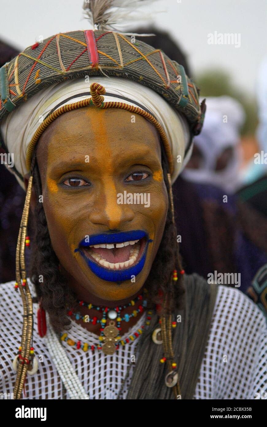 Niger. A Wodaabe-Bororo man with his face painted for the annual ...