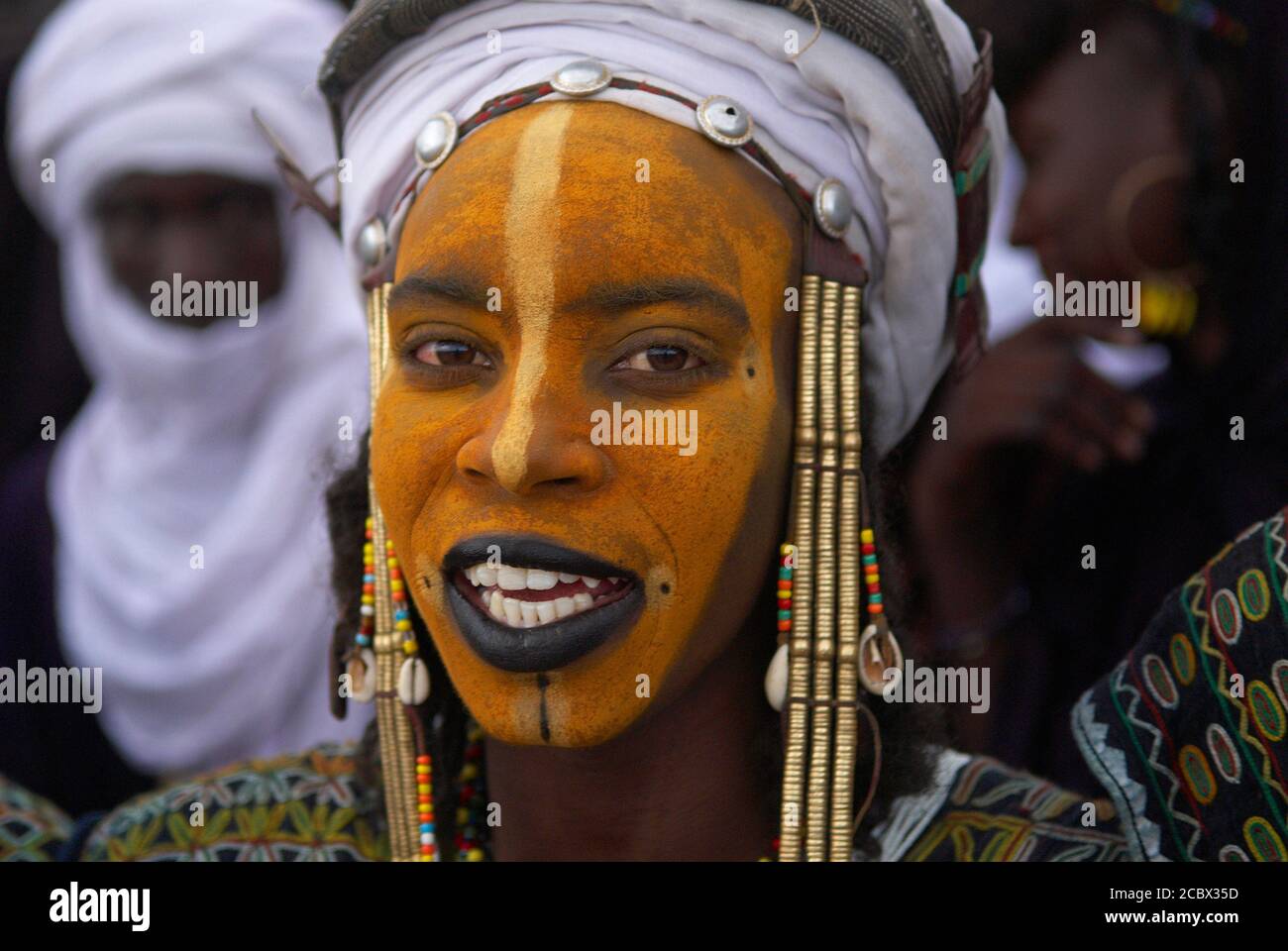 Niger. A Wodaabe-Bororo man with his face painted for the annual ...