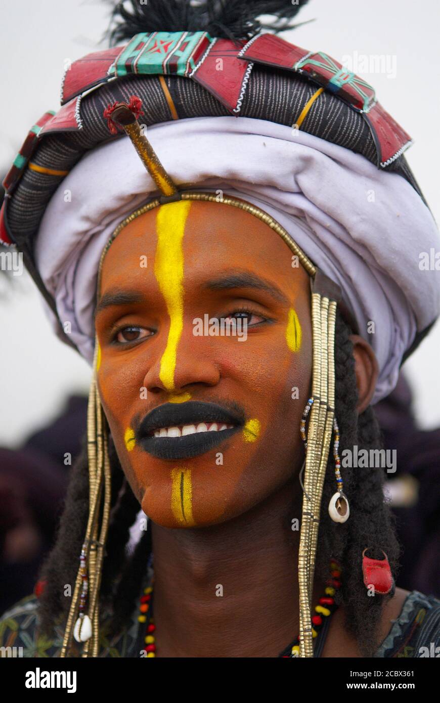 Niger. A Wodaabe-Bororo man with his face painted for the annual ...
