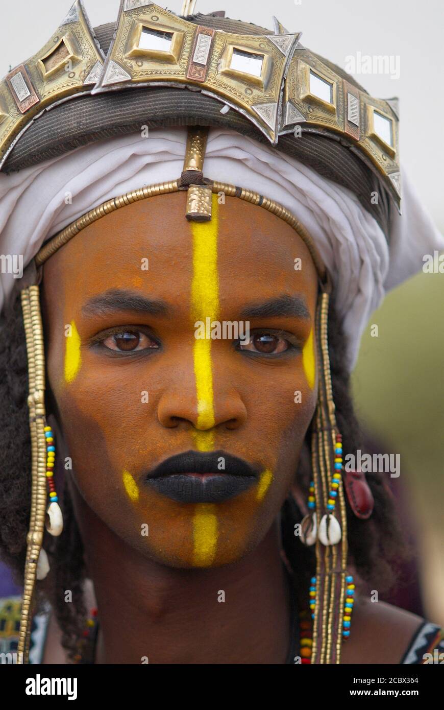 Niger. A Wodaabe-Bororo man with his face painted for the annual ...