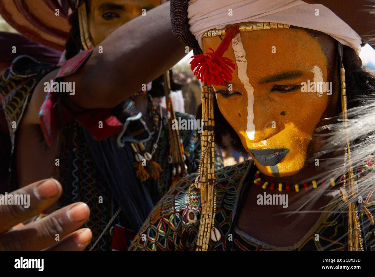 Niger. A Wodaabe-Bororo man with his face painted for the annual ...
