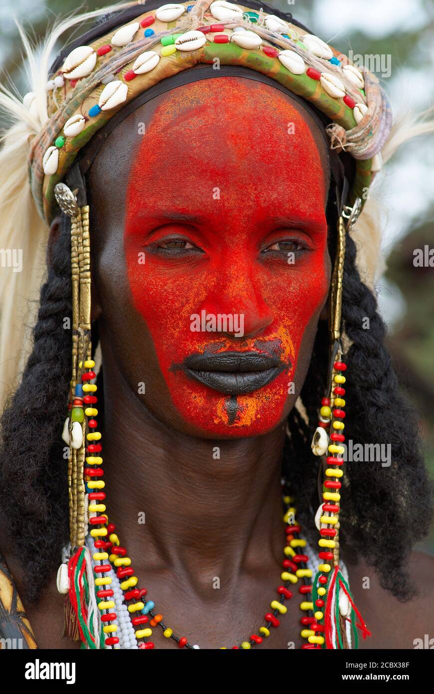 Niger. A Wodaabe-Bororo man with his face painted for the annual ...